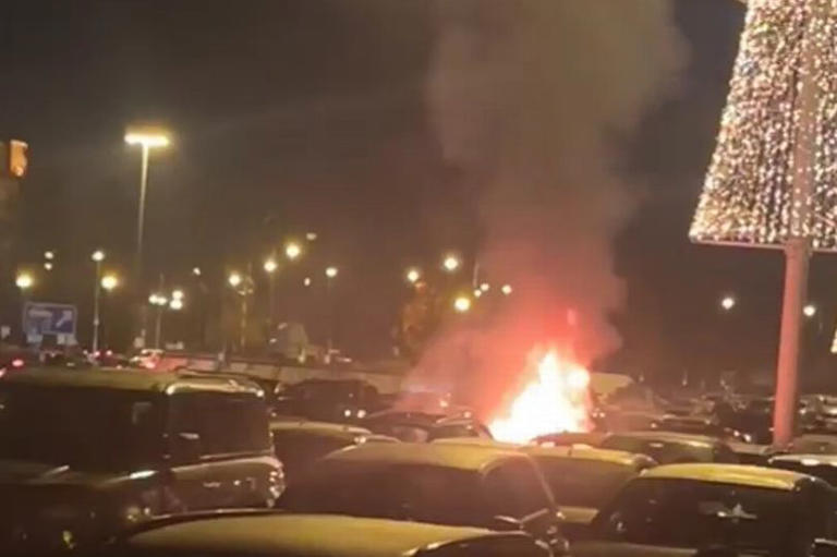 Emergency services rush to Trafford Centre as fire breaks out on car park