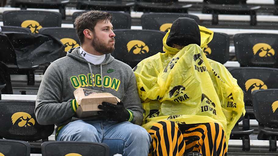 Live Score Updates as Oregon And Iowa Battle In Pouring Rain