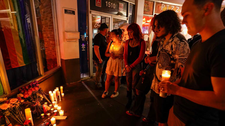 Scenes from vigil for victims killed in Ybor City crash