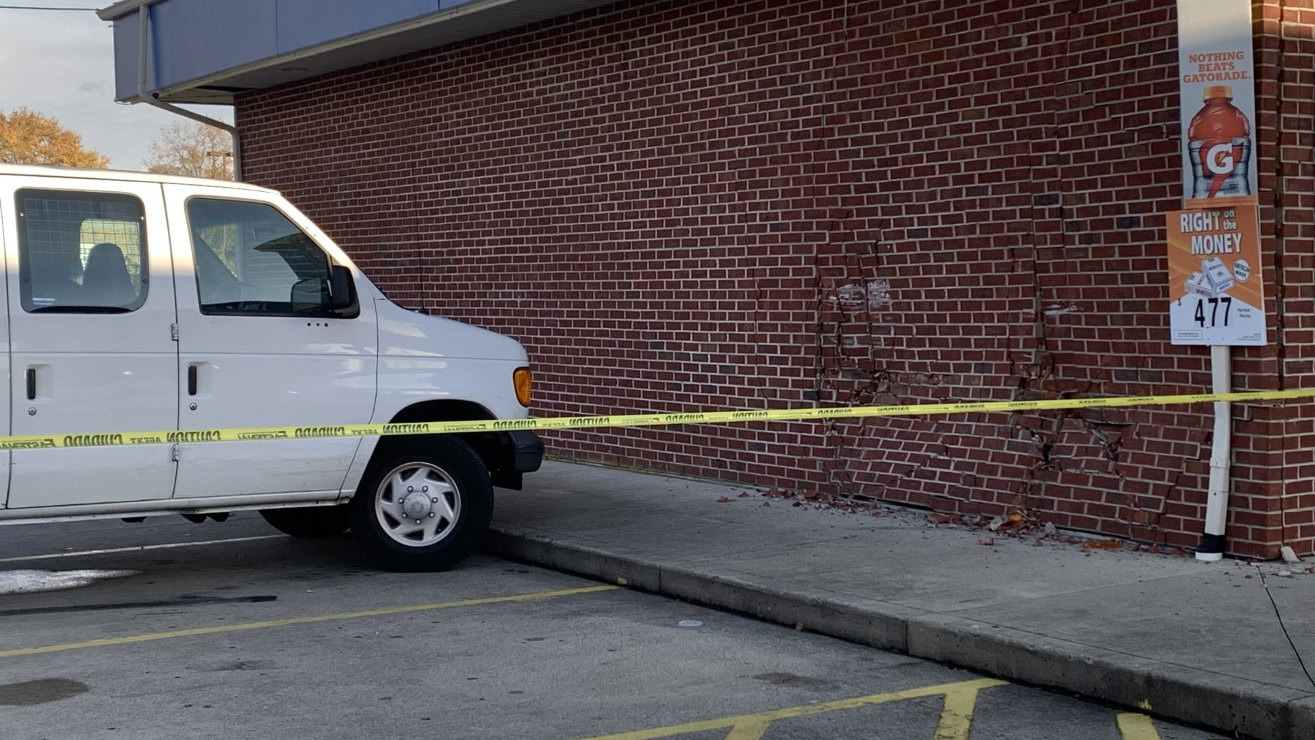Van jumps curb, crashes into Huber Heights gas station