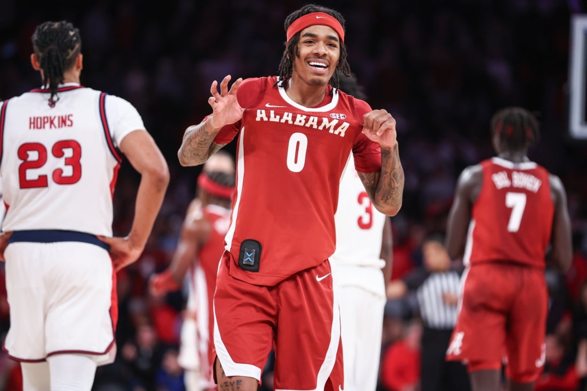 No. 15 Alabama withstands comeback to top No. 5 St. John's