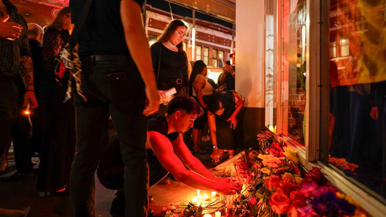 Scenes from vigil for victims killed in Ybor City crash