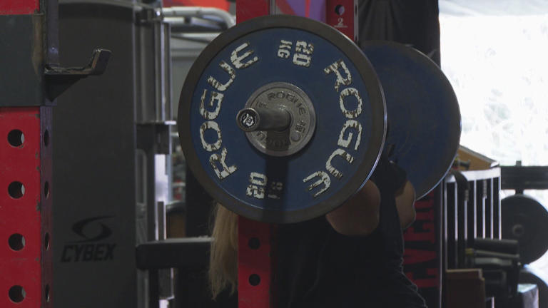 Lifting through loss: one young athlete’s push to honor late coach’s memory