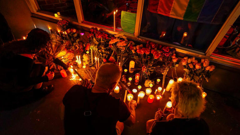 Scenes from vigil for victims killed in Ybor City crash