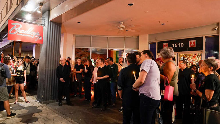 Scenes from vigil for victims killed in Ybor City crash