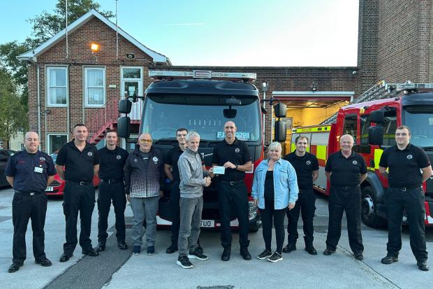 Local football club raises money for firefighters' charity