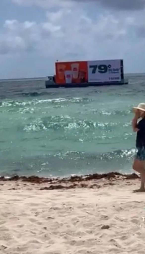 Outraged beachgoers capture video of floating 'abomination' in the ...
