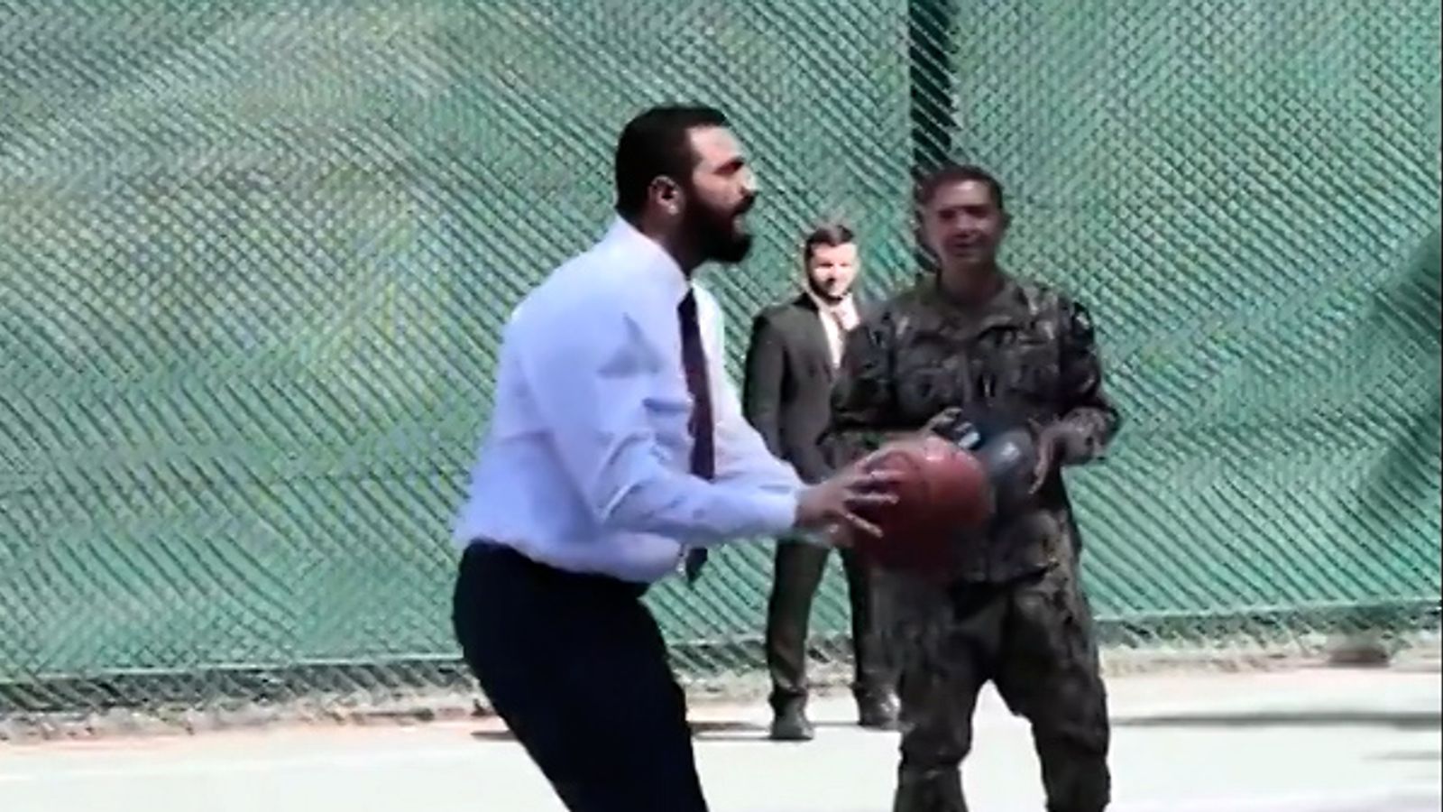Syrian president plays basketball with US commanders