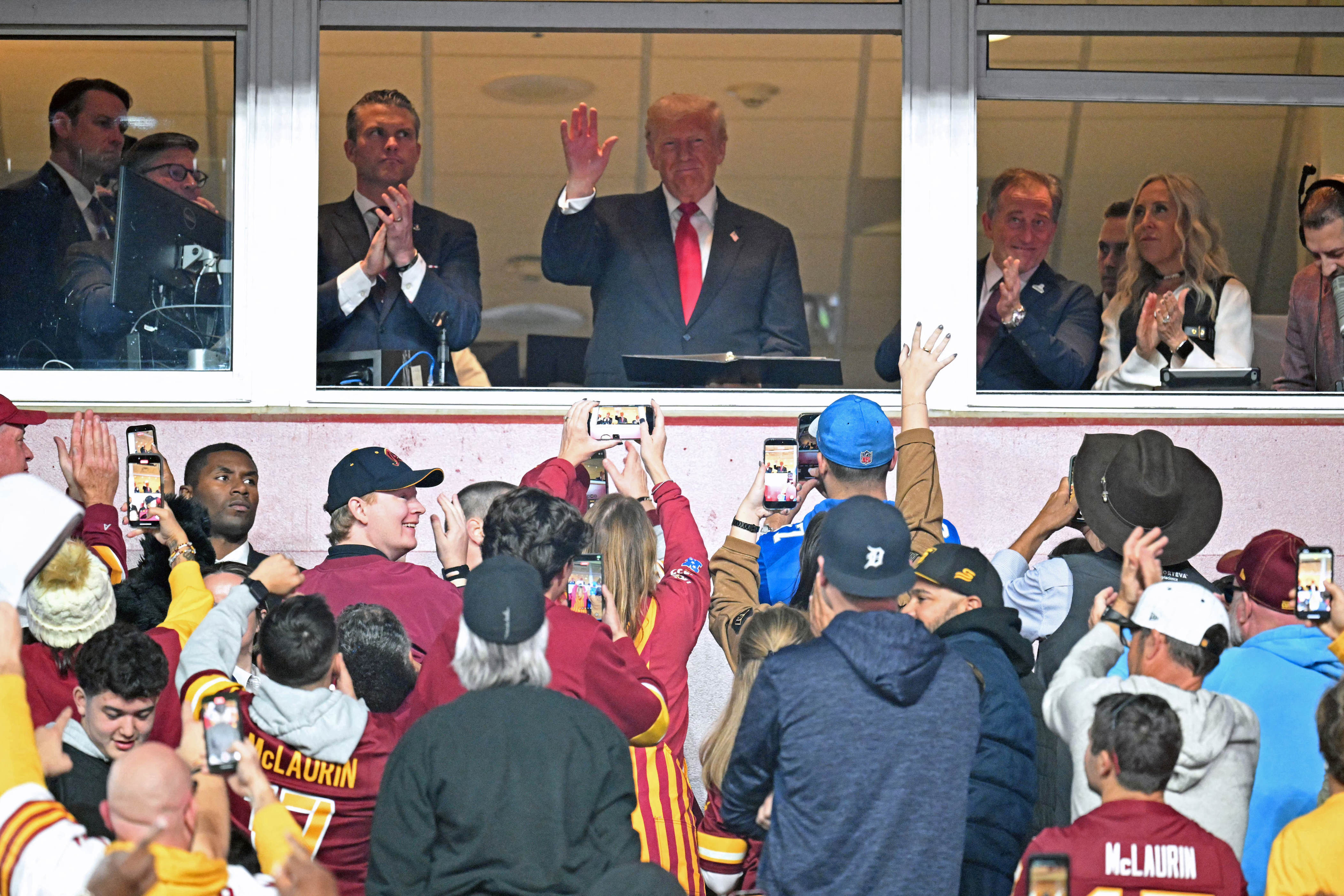 Trump makes historic NFL appearance, draws boos from crowd
