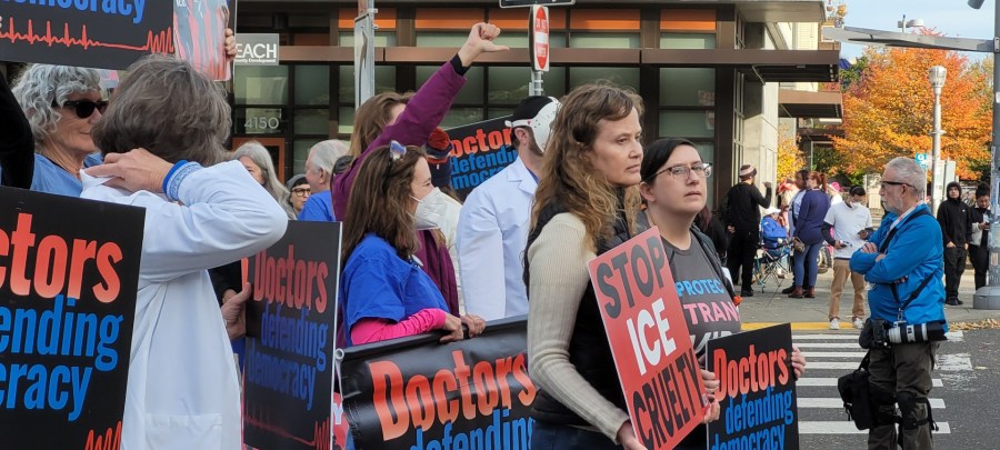 Healthcare workers, aerobics fans hold separate protests outside ...