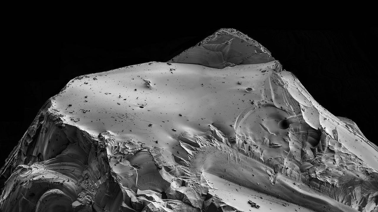 Lunar impact glass becomes a mighty mountain in new 'Nanocosmos ...