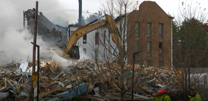 Demolition underway after devastating fire at apartment complex