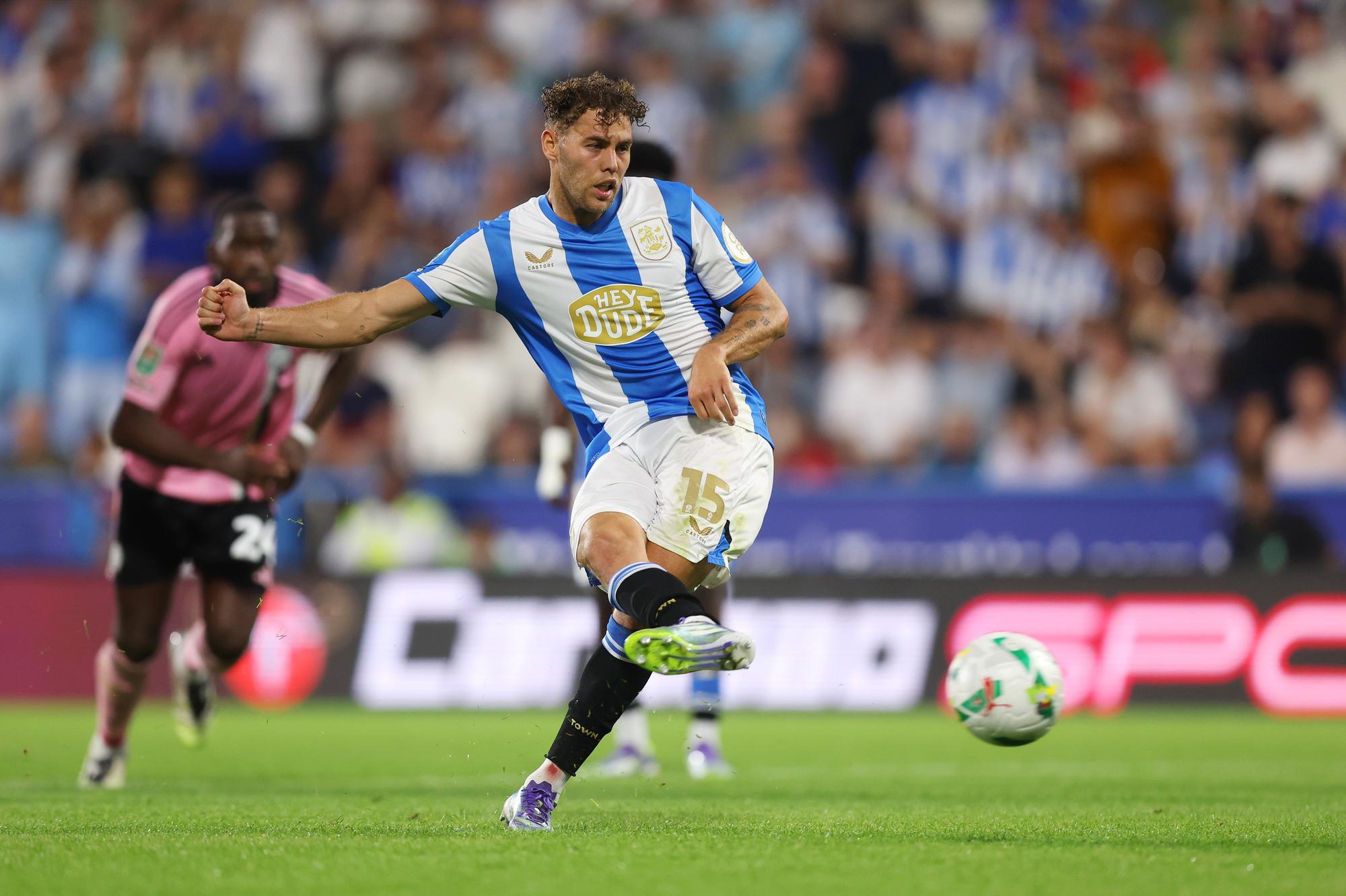 Jeers turn to cheers as Dion Charles-inspired Huddersfield Town secure ...