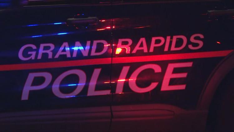 Police: Woman killed in crash after car runs red light in Grand Rapids