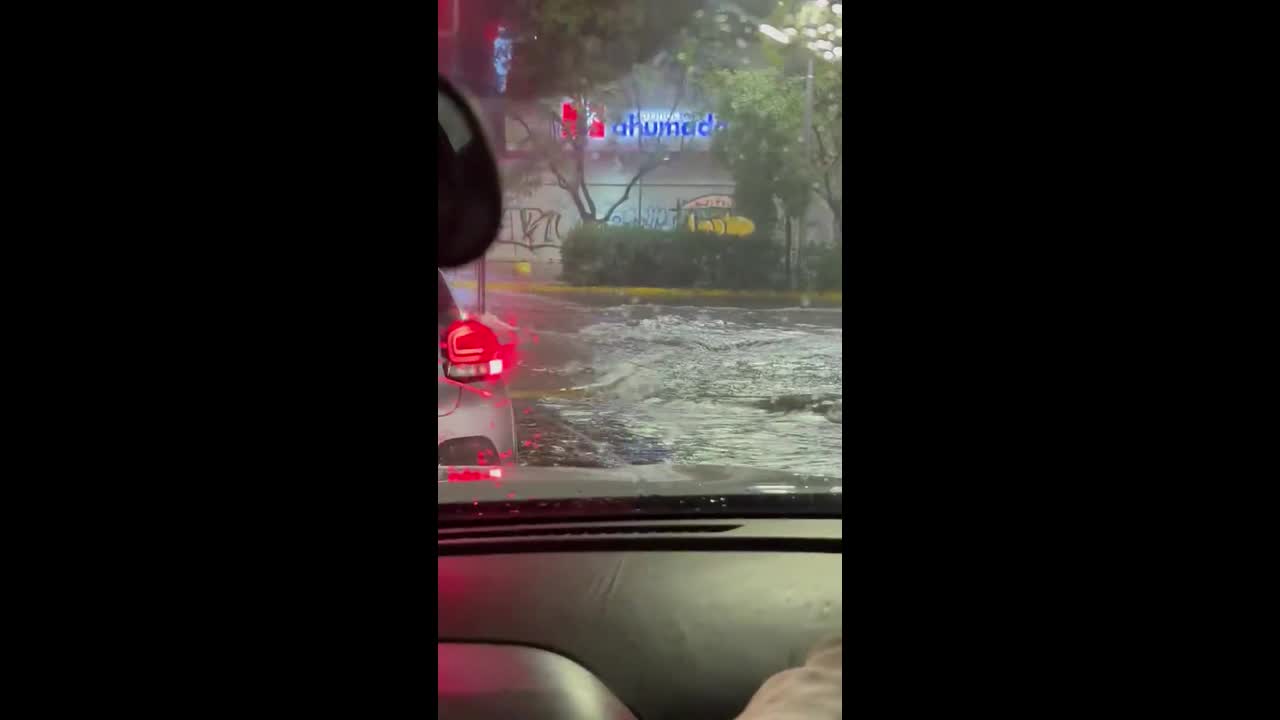 River overflows after heavy rain in Santiago, Chile