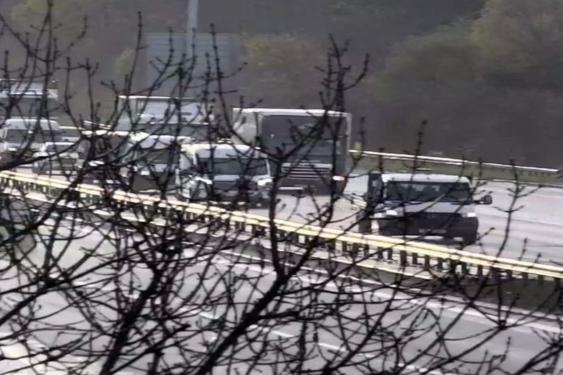 BMW driver dies after M74 rush hour crash sees police shut down road ...