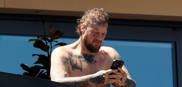 Jelly Roll proudly shows off dramatic weight loss during shirtless ...