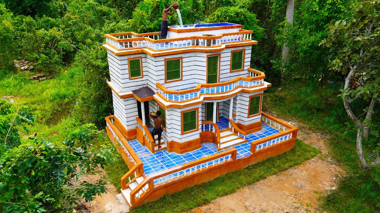 Primitive builders create a two-story jungle villa with a sparkling ...