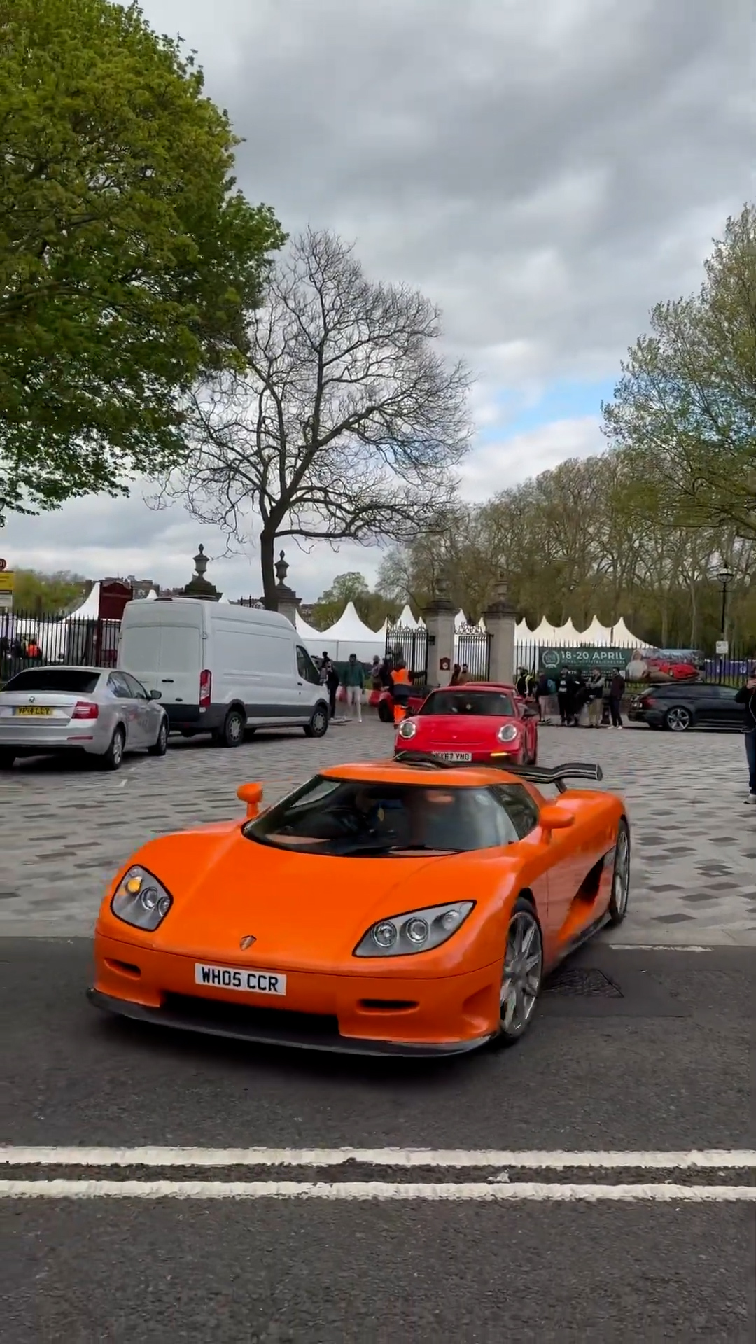 Bright Orange CCR Rolls Past Crowd