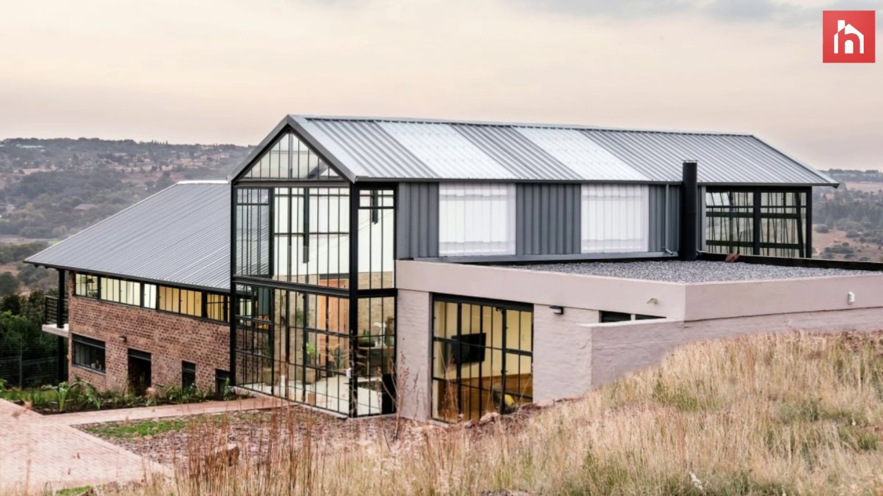 Cool house features a large conservatory volume at its core