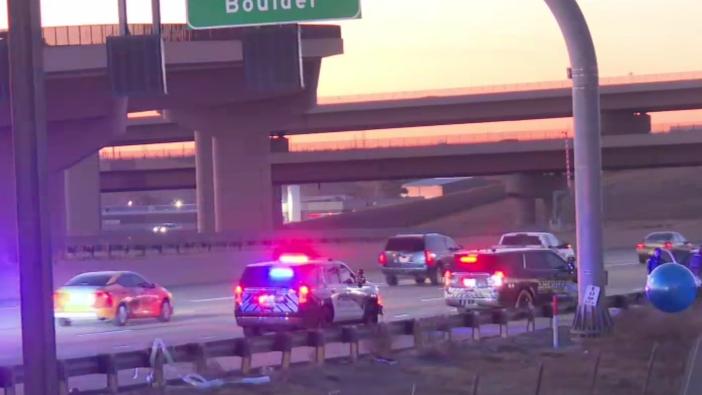 Colorado deputy's car window shot out, 2 arrested after pursuit on I-25