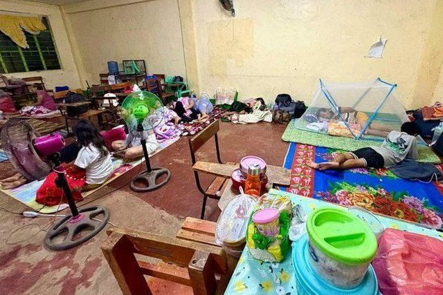 Flood forces evacuees to leave school in Cauayan, Isabela