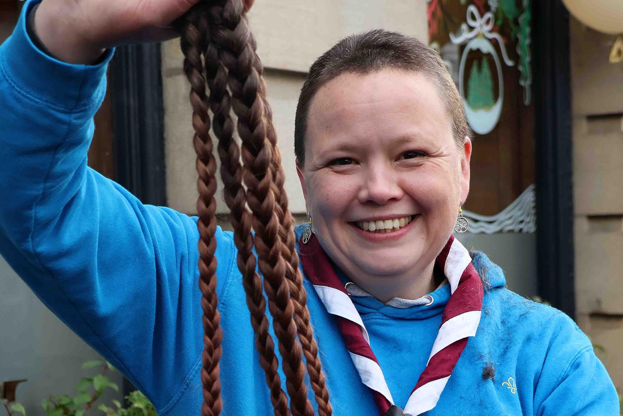 Beaver leader chops off her long locks in aid of Ingleton Scouts Group