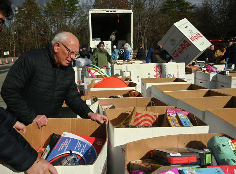 Photos: 12th annual Convoy for Tots delivers toys to SPAC