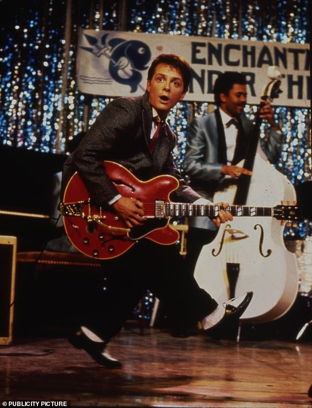 Michael J Fox rocks out to a Back To The Future-style performance at ...
