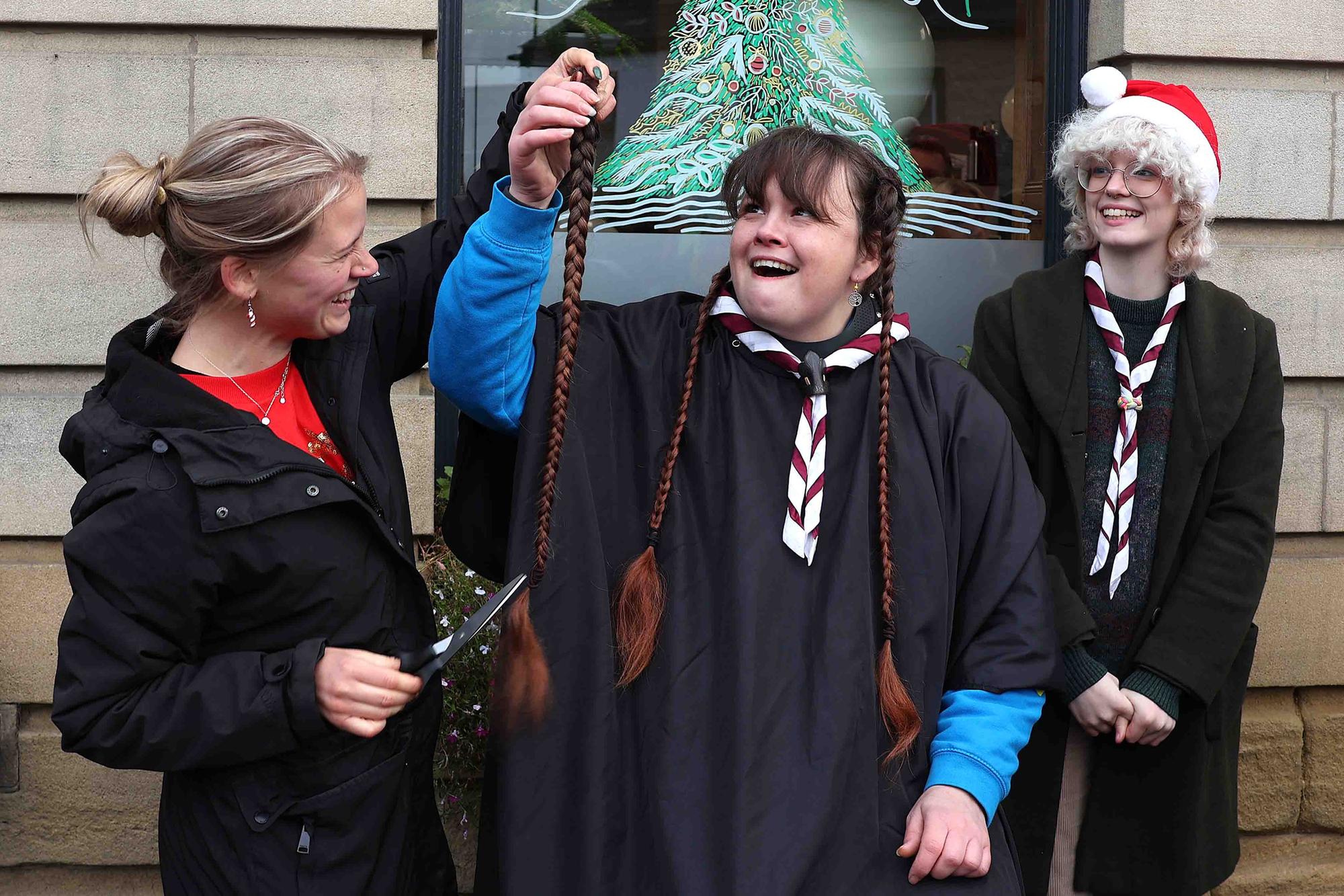 Beaver leader chops off her long locks in aid of Ingleton Scouts Group