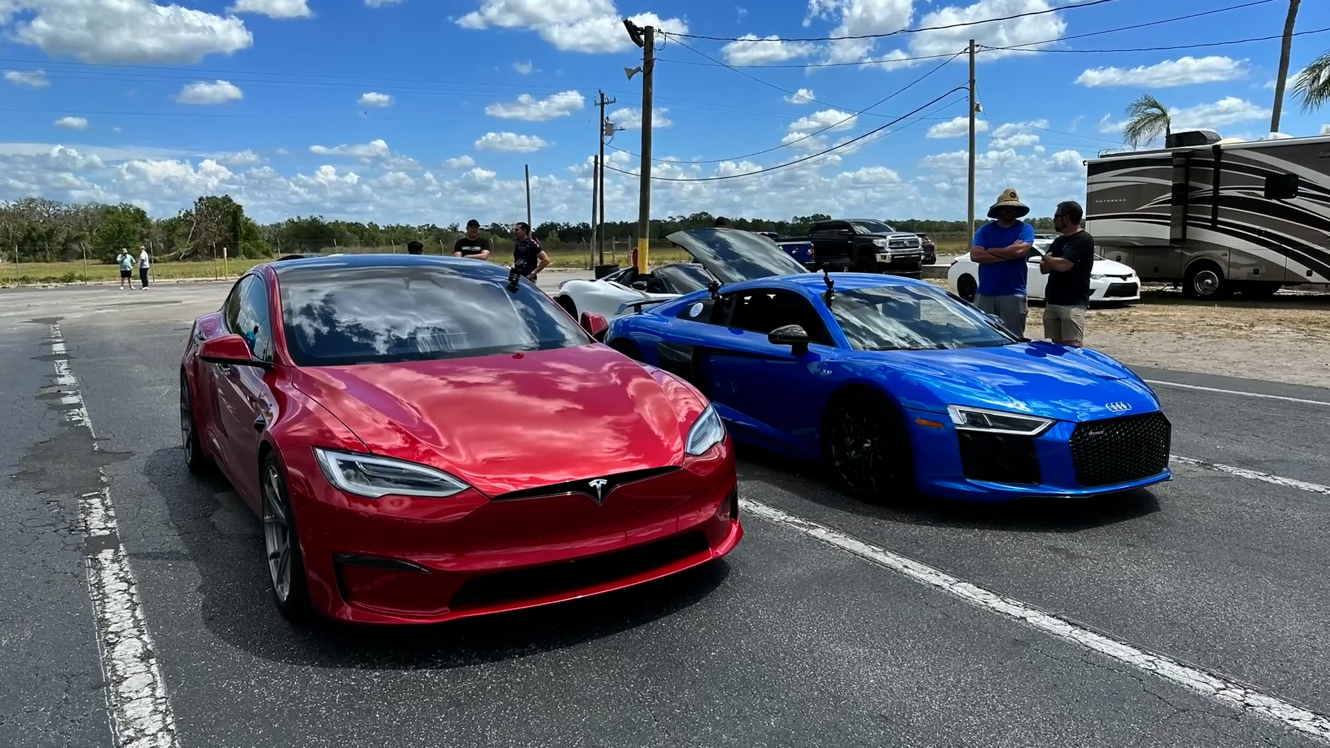 Audi R8 Twin Turbo vs Tesla Plaid Quarter-Mile Race