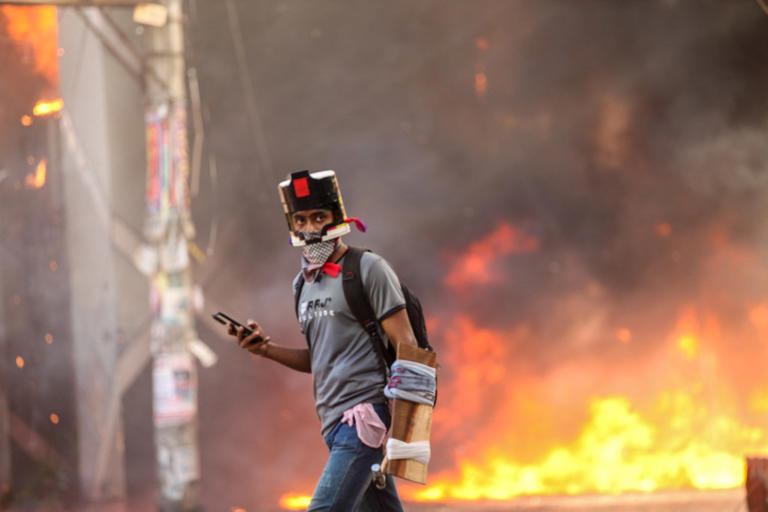 Ex-prime minister sentenced to death over 1,400 student protest deaths