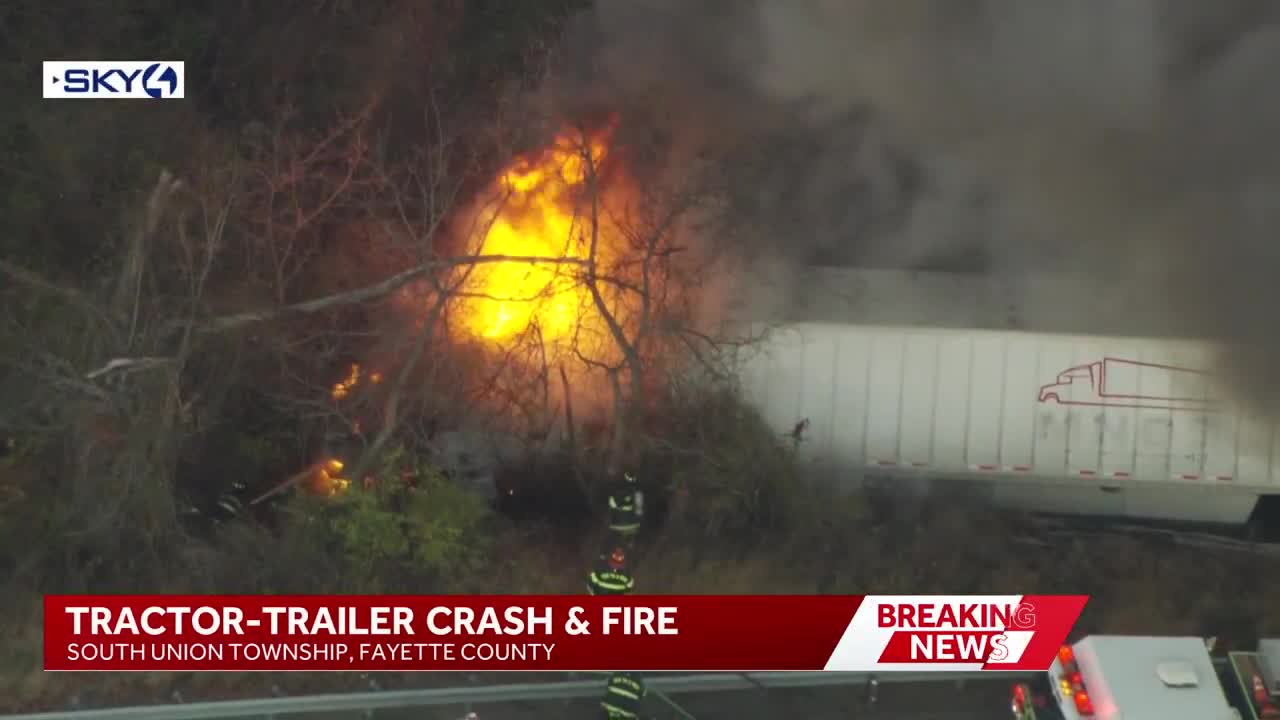 Tractor-trailer crashes off road, catches fire in Fayette County