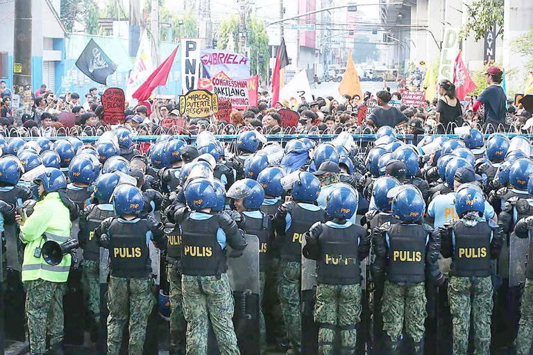Police covering INC rally using body-worn cameras