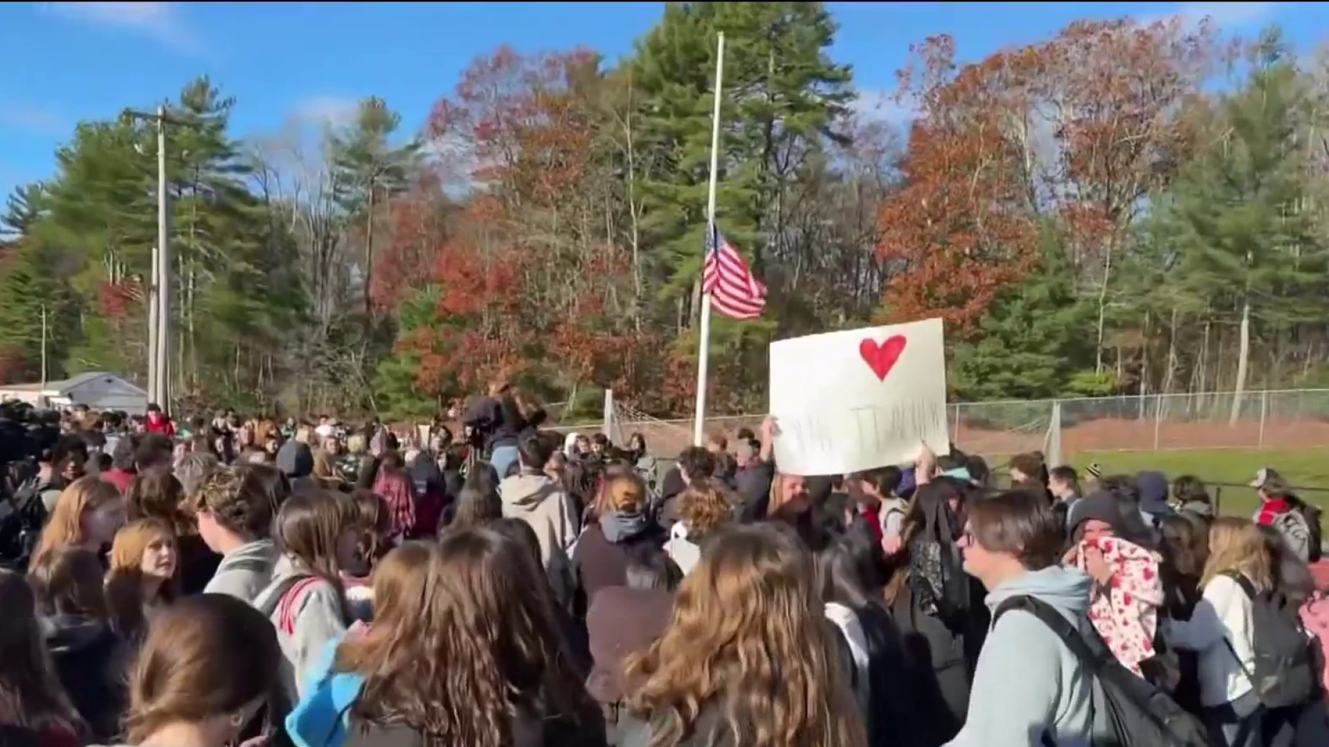 Students walk out to protest job cuts at Massachusetts school district