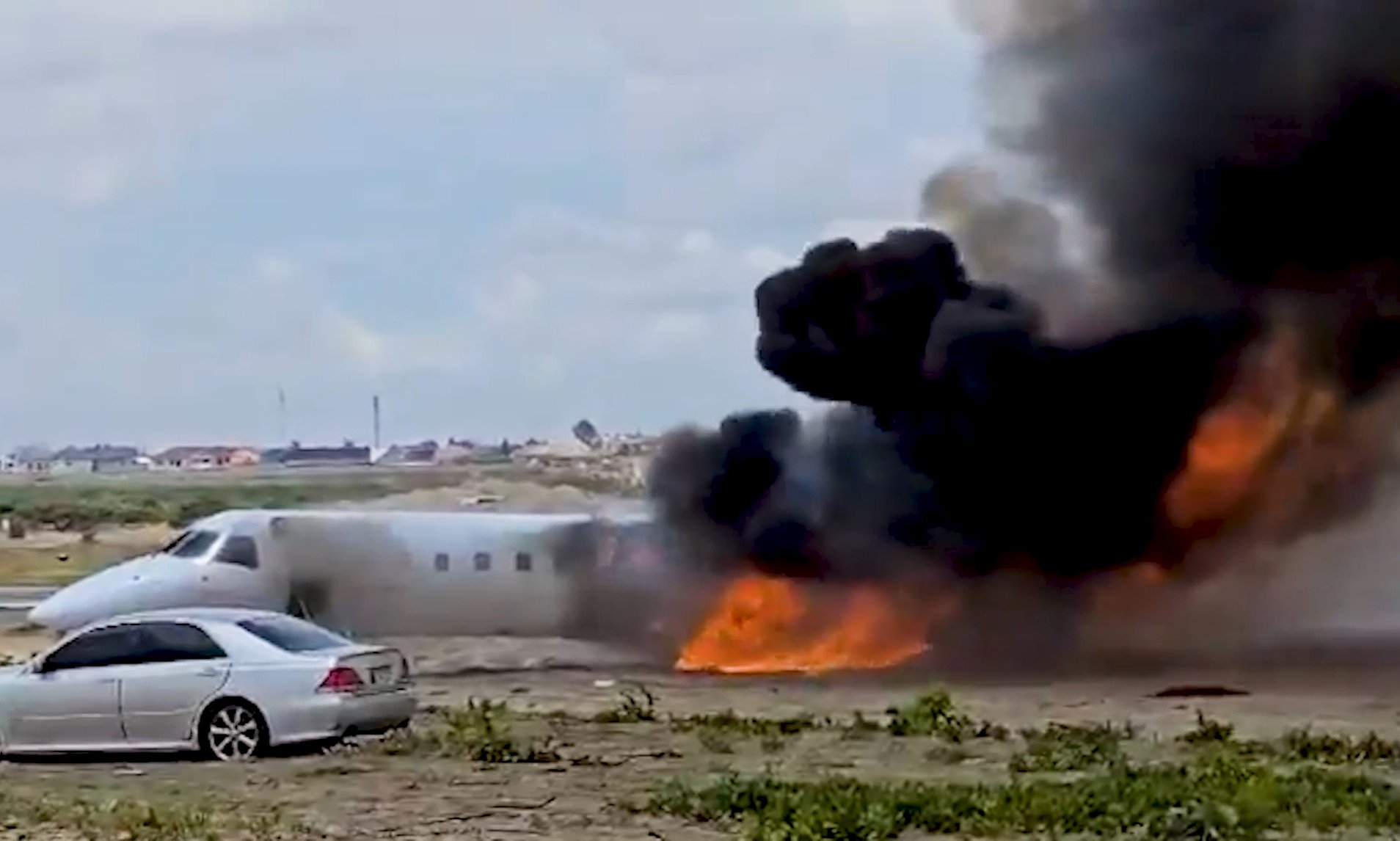 Moment minister's jet bursts into flame as it crashes after shooting ...