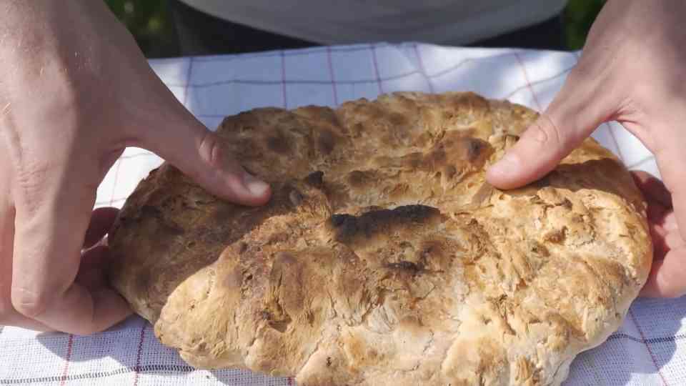Homemade bread baked traditionally under the bell