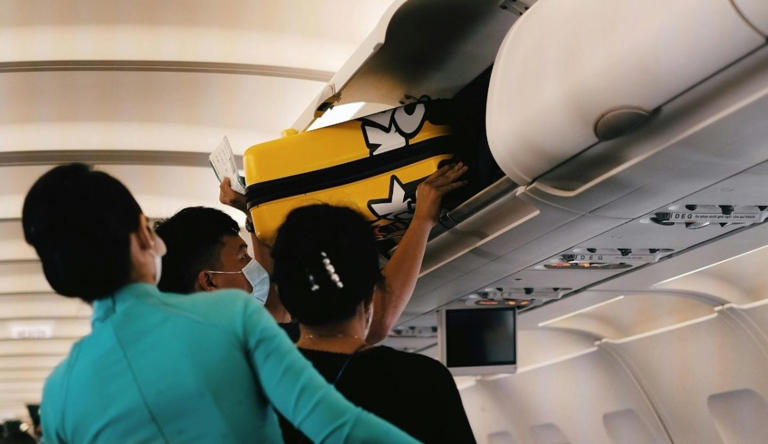 The Overhead Bin Etiquette Flight Attendants Wish Travelers Would ...