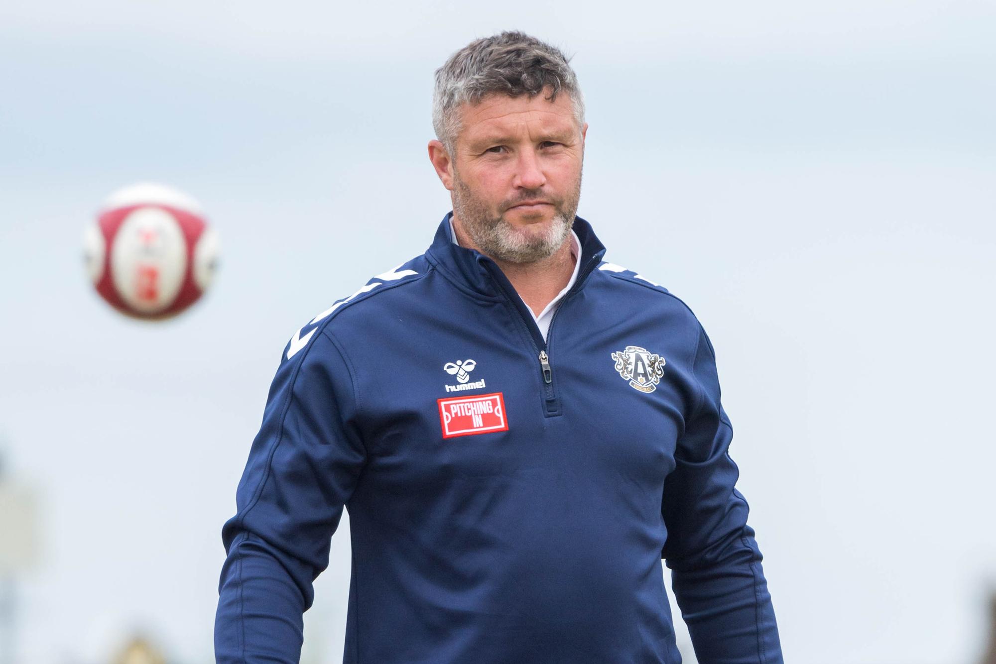 Ashington's assistant manager Liam McIvor voices his frustration after defeat