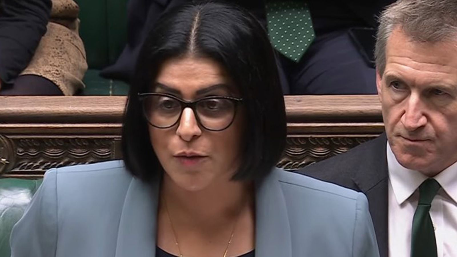Home secretary uses expletive in asylum debate