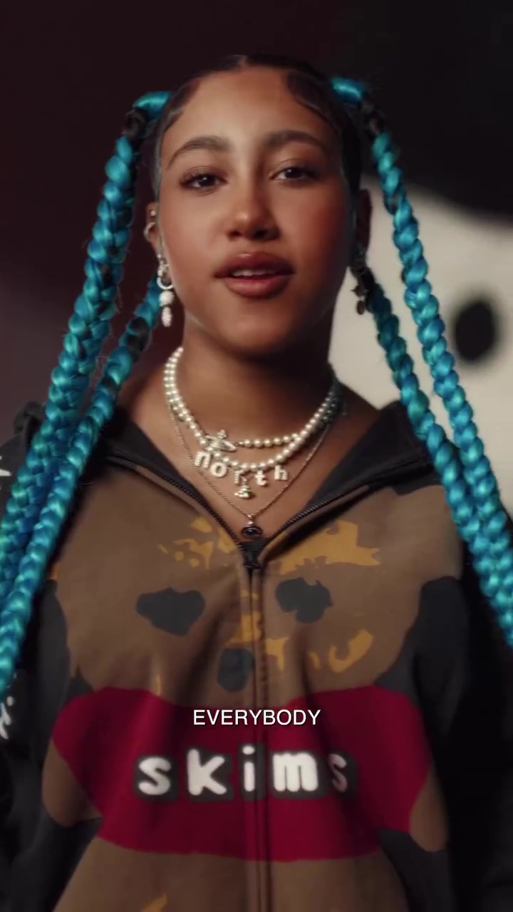 North West shows off hip-length blue braids in Skims holiday campaign