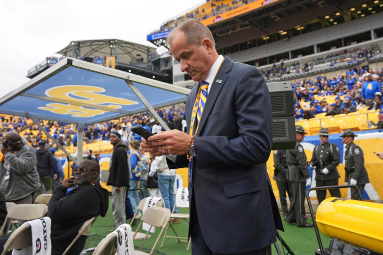 On the road again: AP joins ACC commissioner Jim Phillips as he racks ...