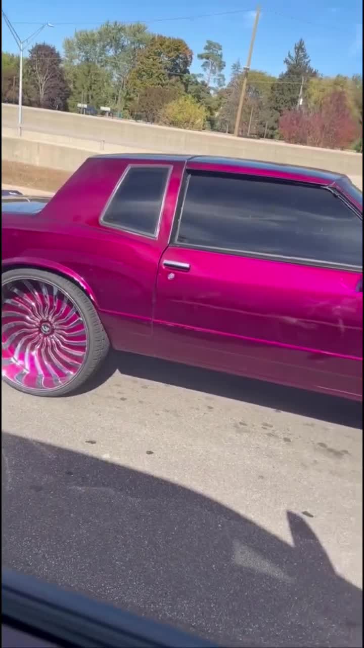 Candy purple Chevy Monte Carlo SS on 26’s Forgiatos riding