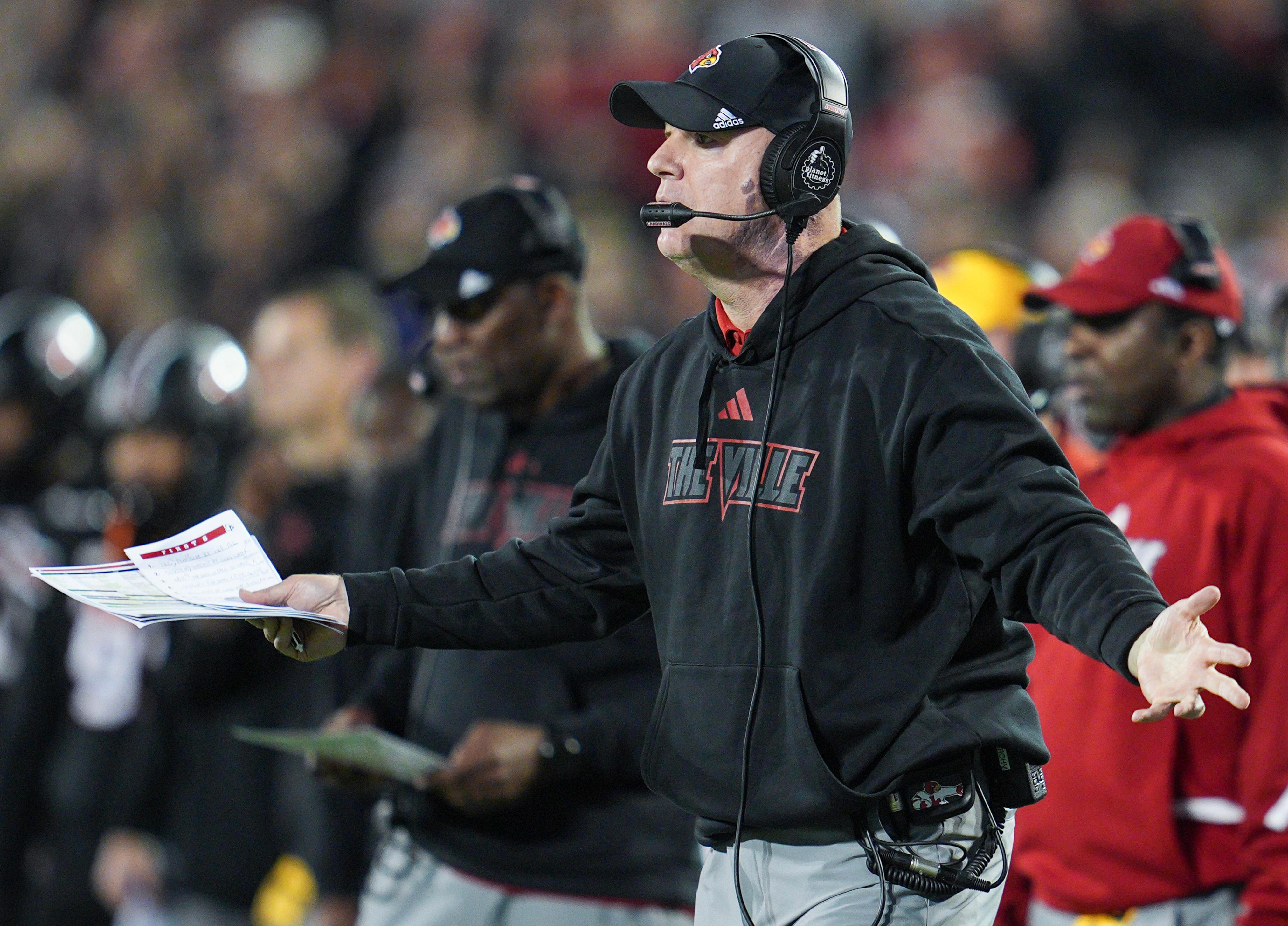 Texas man who allegedly threatened UofL football coach resigns from his ...