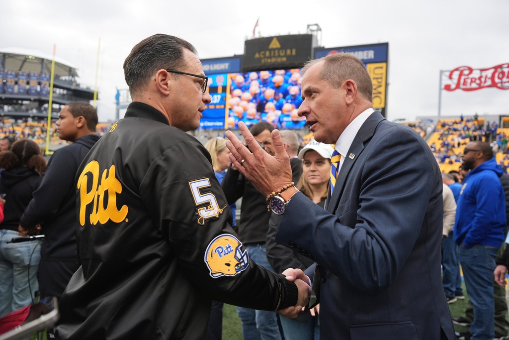 On the road again: AP joins ACC commissioner Jim Phillips as he racks ...