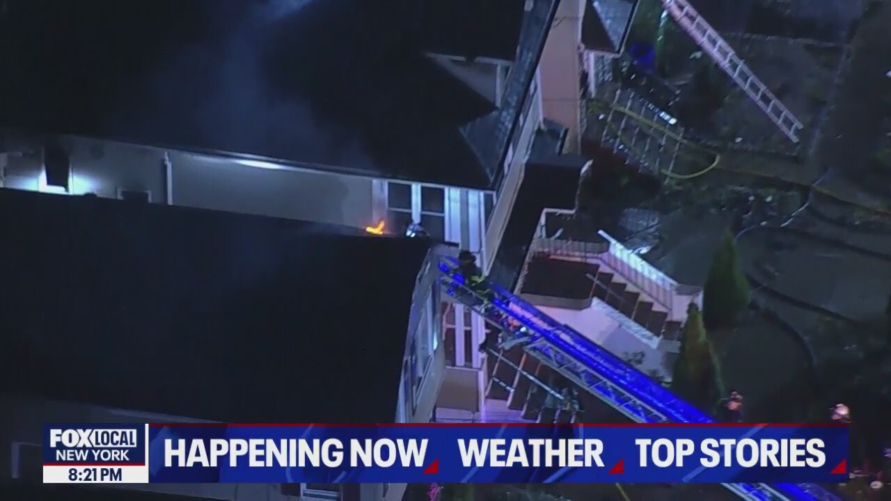 4-alarm fire tears through three multi-family homes in Roselle, New Jersey
