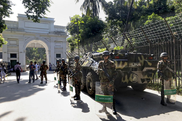 Calm but tense Bangladesh under tight security as Awami League calls ...