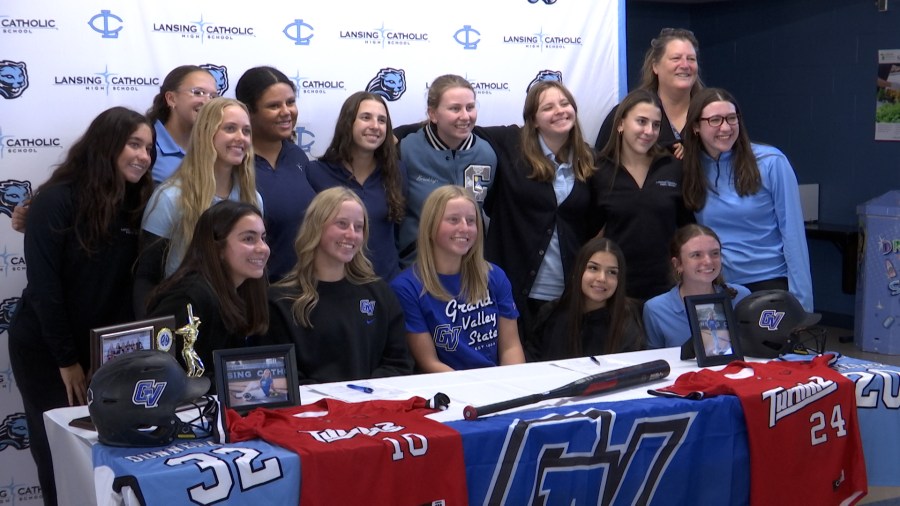 Lansing Catholic softball standouts Avery and Taylor Dunneback sign ...