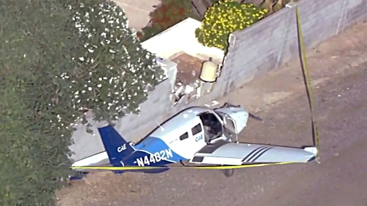 Pilot crashes small plane into canal wall during emergency landing in ...