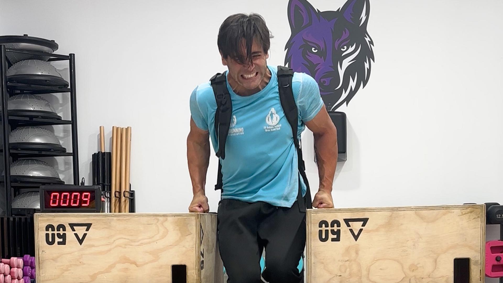 Most elevated knuckle tricep dips with 100lb pack in one minute (male ...